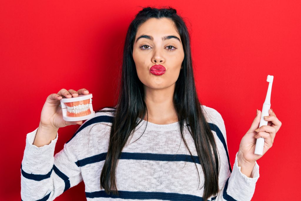 Happy Hearts: 4 Tips for Kissing with Dentures | Jupiter Implant and ...